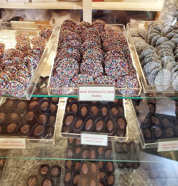 Row after row of handcrafted chocolates create the kind of decision paralysis that's actually quite pleasant.