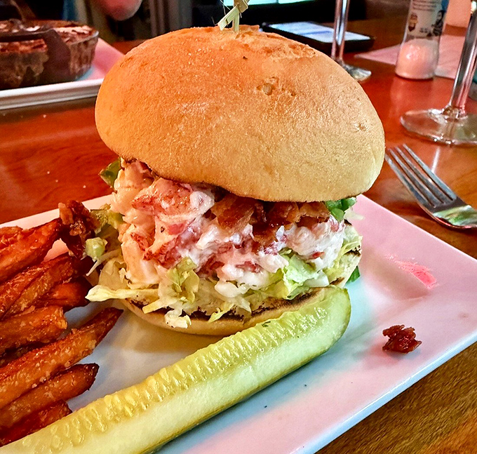 The crown jewel of Maine cuisine nestled in a golden bun&mdash;sweet lobster meat meets crisp lettuce in a handheld celebration of the sea.