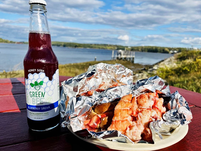 Maine's perfect pairing: a lobster roll with a view and local blueberry soda that tastes like summer in a bottle.