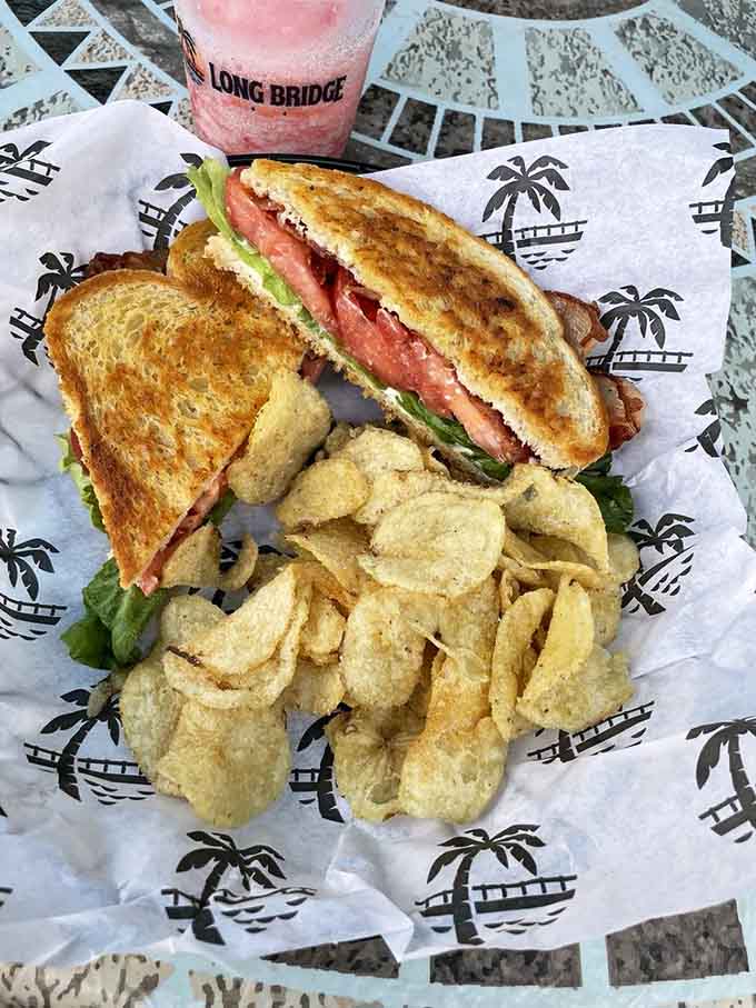 A classic BLT with kettle chips delivers comfort food perfection when you need a break from wings.