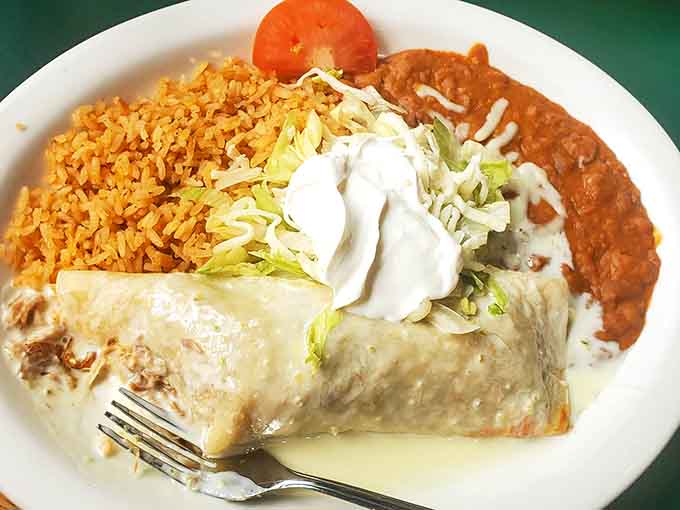 This enchilada plate proves that comfort food doesn't need fancy plating when it's too busy being absolutely delicious and soul-satisfying instead.