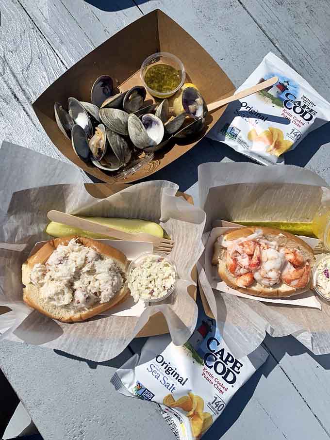 The dynamic duo of grilled clams and a lobster roll, because sometimes you just can't choose between two perfect things.