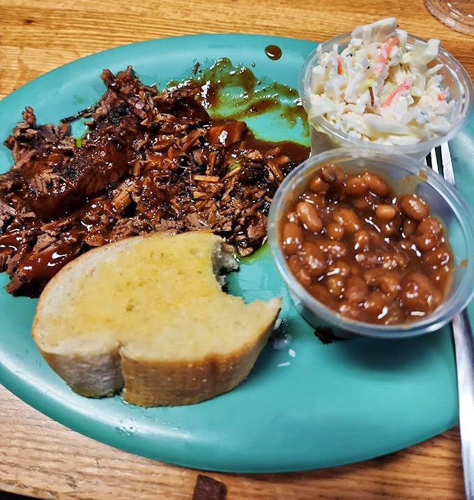 A BBQ trinity &ndash; smoky brisket, sweet-savory beans, and creamy coleslaw create the perfect balance of flavors and textures.