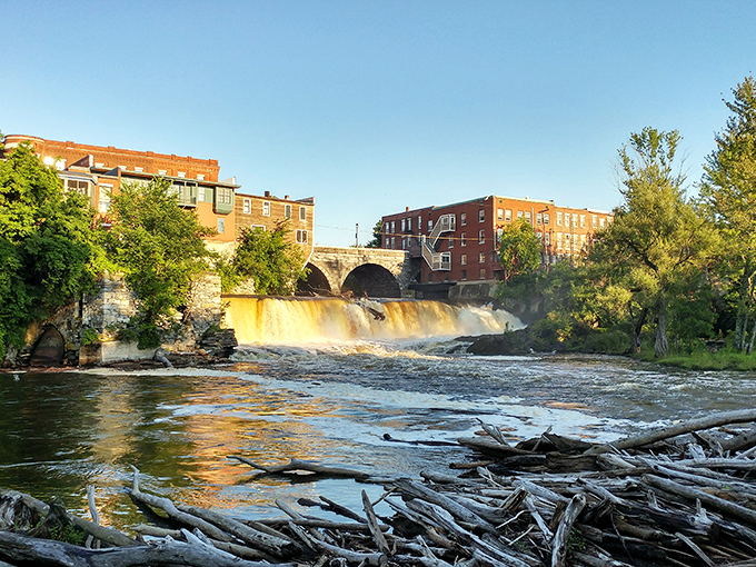 Middlebury Falls: Water cascades through downtown with hypnotic power, creating nature's soundtrack for shoppers, diners, and anyone needing a moment of zen.