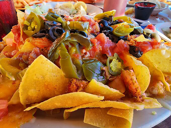 These aren't your average nachos &ndash; they're a seafood fiesta topped with Gulf shrimp, jalape&ntilde;os, and enough cheese to make a seagull jealous.