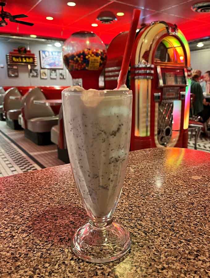 The mint chocolate chip shake arrives looking like a work of art, proving that some masterpieces are meant to be consumed.