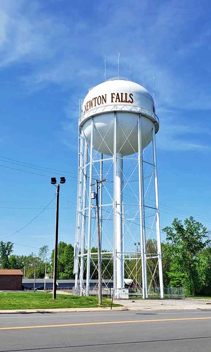 The iconic water tower stands tall against the blue Ohio sky, proudly announcing "NEWTON FALLS" to travelers and locals alike.