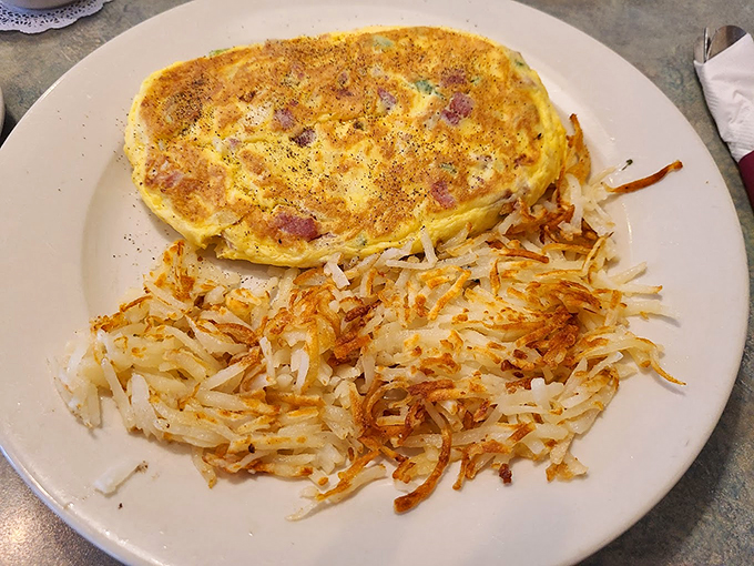 Fluffy, stuffed, and ready to rock your world. This omelet is like a treasure chest of flavors, each bite a delicious surprise.