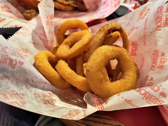 Golden-brown onion rings with the perfect crunch-to-tenderness ratio &ndash; the supporting actors that steal scenes in this food drama.