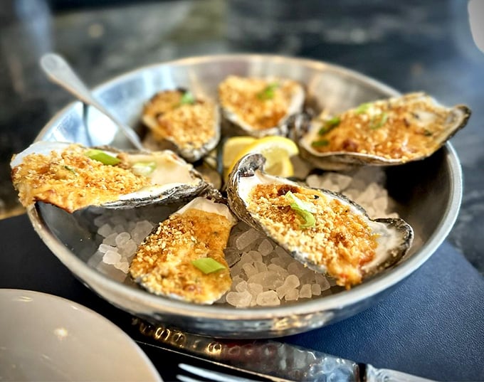 Golden-crusted oysters nestled on ice &ndash; these briny treasures from the raw bar offer the ocean's finest flavors in each perfect bite.