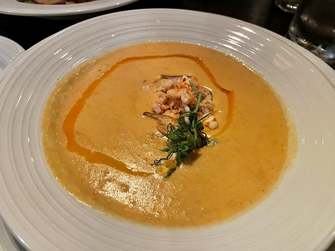 This lobster bisque is liquid gold in a bowl, rich and velvety with chunks of lobster that prove good things come to those who order soup.