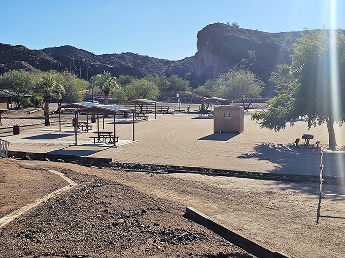 A lone picnic table under twin palms offers front-row seats to Lake Havasu's beauty &ndash; the perfect spot for lunch with a million-dollar view.