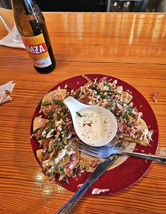 Polish-Mexican fusion? These "nachos" replace tortilla chips with pierogies, creating a cross-cultural masterpiece that's both genius and delicious.