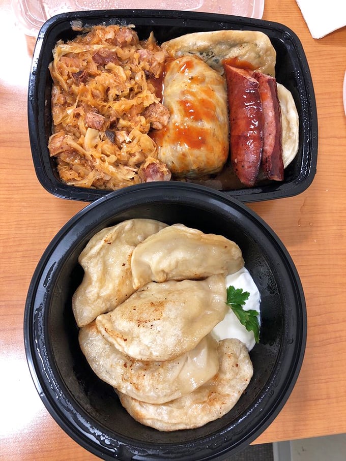 The greatest hits album of Polish cuisine &ndash; dumplings, sausage, and cabbage creating a symphony of flavors on one plate.