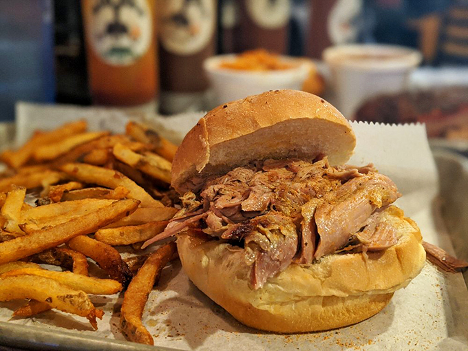 This pulled pork sandwich isn't just a meal, it's a religious experience. Prepare for a flavor explosion in your mouth.