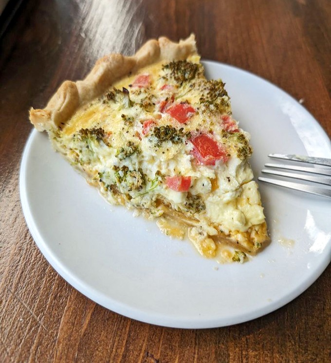 This isn't just quiche&mdash;it's a vegetable party in a buttery crust ballroom. Broccoli and tomatoes dressed in their cheese-covered finest.