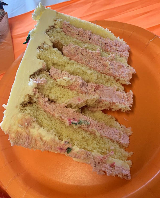 Layer upon delicate layer of yellow cake embraces ribbons of pink cream &ndash; a dessert that's both elegant and playful.