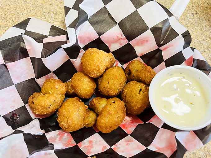 Golden battered mushrooms that prove vegetables can be indulgent when you treat them right with hot oil.