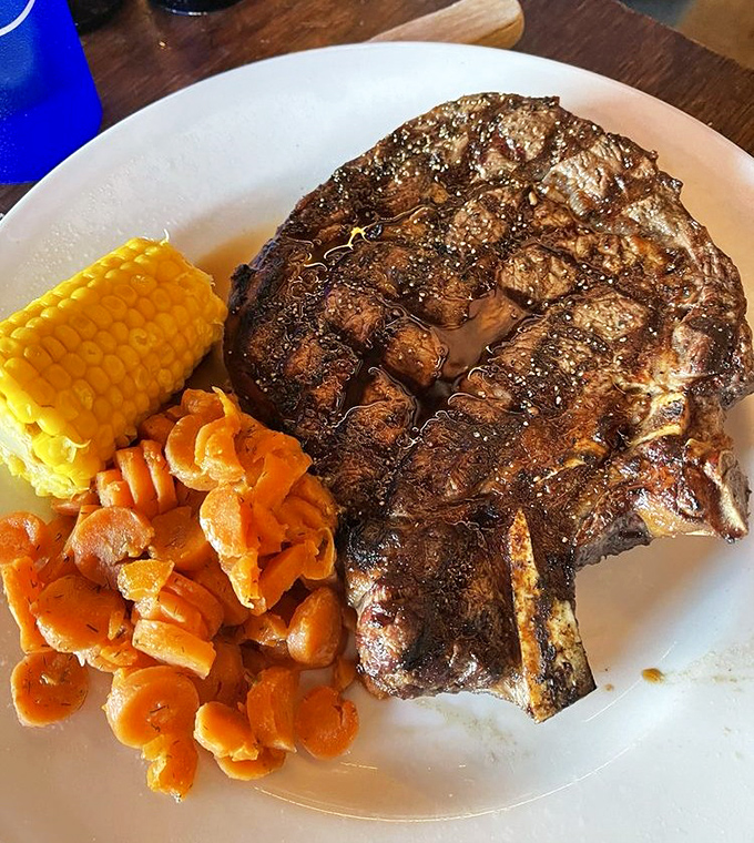 The Wrangler Bone-In Ribeye doesn't just satisfy hunger – it conquers it. Perfectly seared, juicy, and large enough to make a grown cowboy weep.