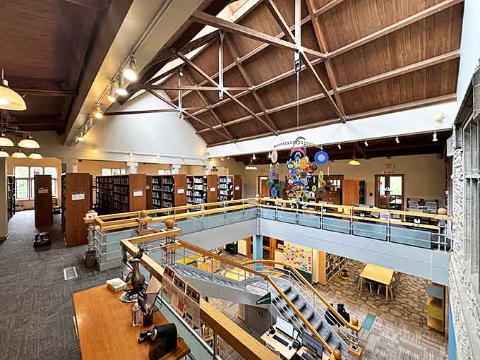 Inside the library, those soaring ceilings and warm wood tones make reading feel like the important activity it actually is.