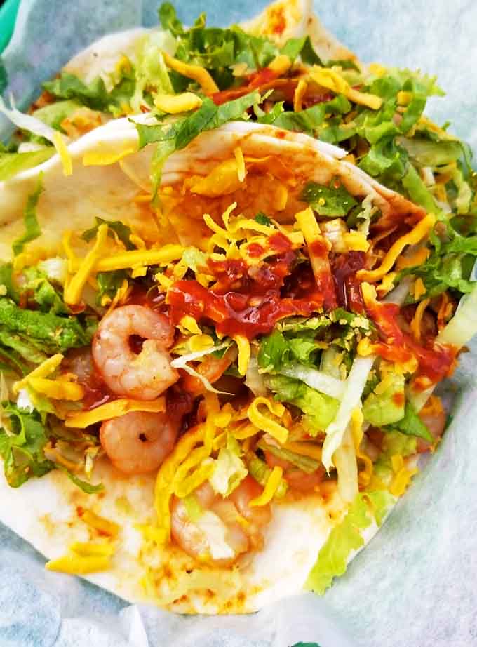 These shrimp tacos bring the ocean to landlocked Minnesota, topped with fresh ingredients that pop with color and flavor.