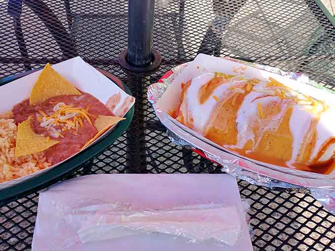 When your burrito comes with chips, cheese dip, and rice, you know someone in that kitchen understands the assignment perfectly.
