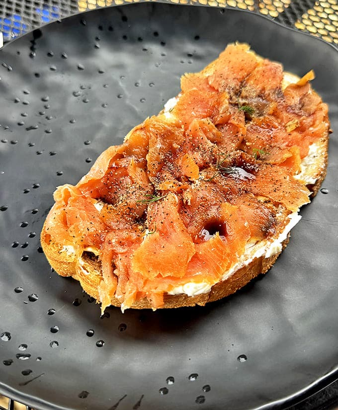 Silky smoked salmon rests on a cloud of cream cheese, proving that this caf&eacute;'s culinary offerings soar well beyond standard coffee shop fare.