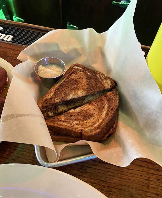 The marble rye grilled cheese achieves that perfect golden-brown crust that makes you want to write poetry about sandwiches and possibly propose marriage.