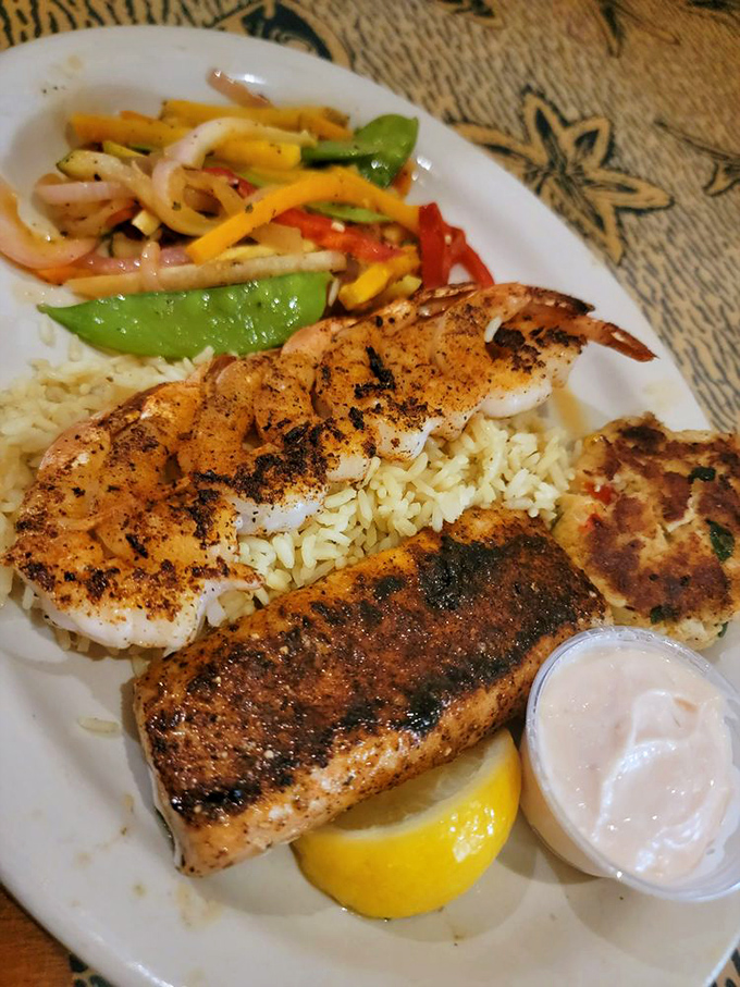 A perfectly grilled trio of seafood excellence &ndash; where each protein is cooked with the precision of a culinary stopwatch.