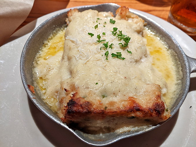 Seafood lasagna that would make Nonna proud – layers of pasta, cheese, and seafood treasures baked until the top achieves that coveted golden crust.