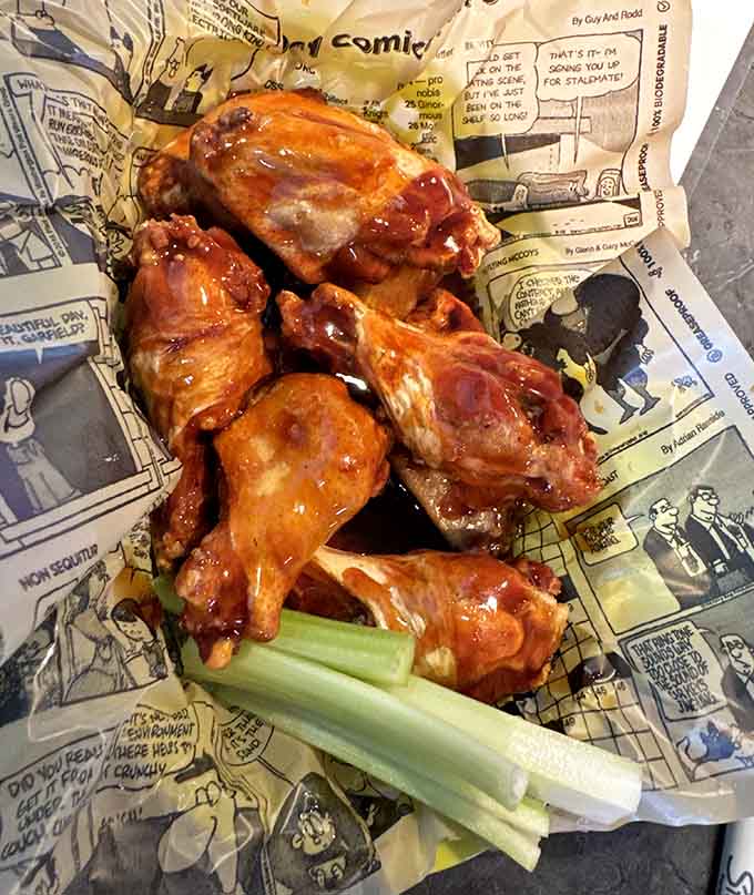 These chicken wings come sauced and ready to make your taste buds very, very happy for the foreseeable future.