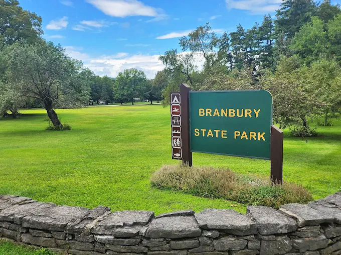 The welcoming sign marks your entry into a world where nature calls the shots and stress isn't invited.