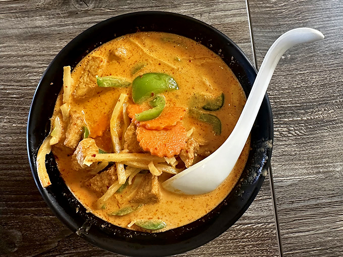 This curry is so vibrant, it could moonlight as a mood ring. Prepare for a flavor explosion that will make your taste buds dance!