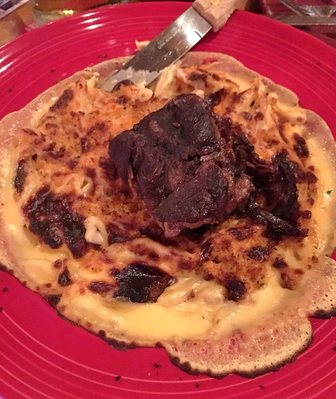 Steak and mac and cheese sharing a plate isn't just a meal, it's a life philosophy. Why choose between favorites?