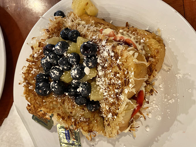 Blueberries dancing atop cream-stuffed French toast &ndash; breakfast that makes you question why we don't eat dessert first.