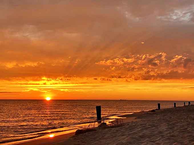 Lake Michigan's daily farewell performance paints the sky in colors so vivid you'll wonder if Mother Nature moonlights as an artist.