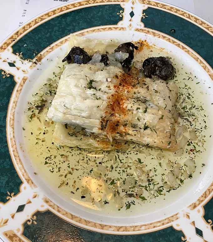 Escargot arrives in classic French style, those garlicky little treasures proving that some traditions never go out of style.