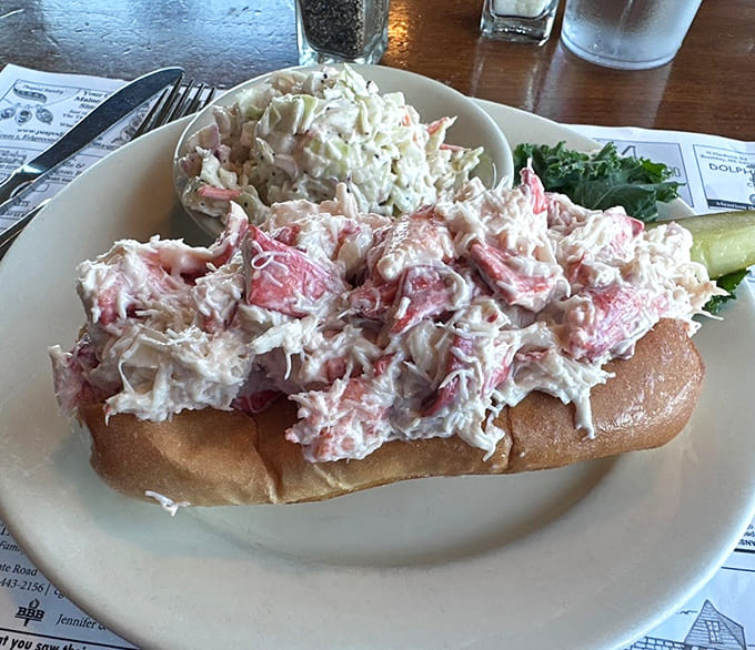 That lobster roll is stuffed so full of meat it looks like it's trying to escape the bun, which is exactly the problem you want.