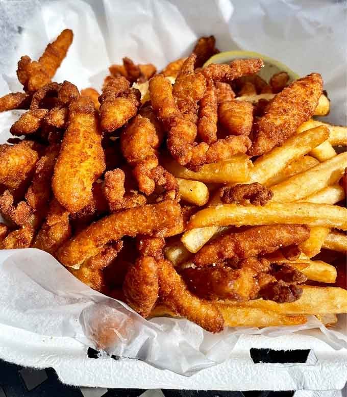 Crispy clam strips and perfectly seasoned fries deliver that satisfying crunch that makes fried seafood absolutely irresistible every time.