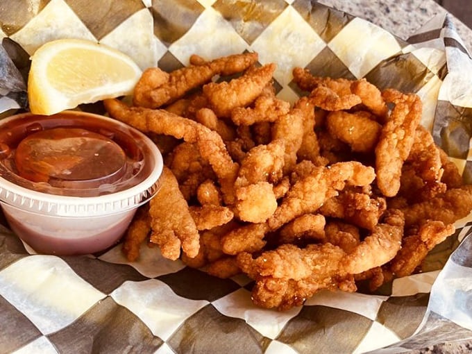 Clam strips that golden and perfectly fried could make even a landlocked diner dream of ocean breezes and seaside adventures.