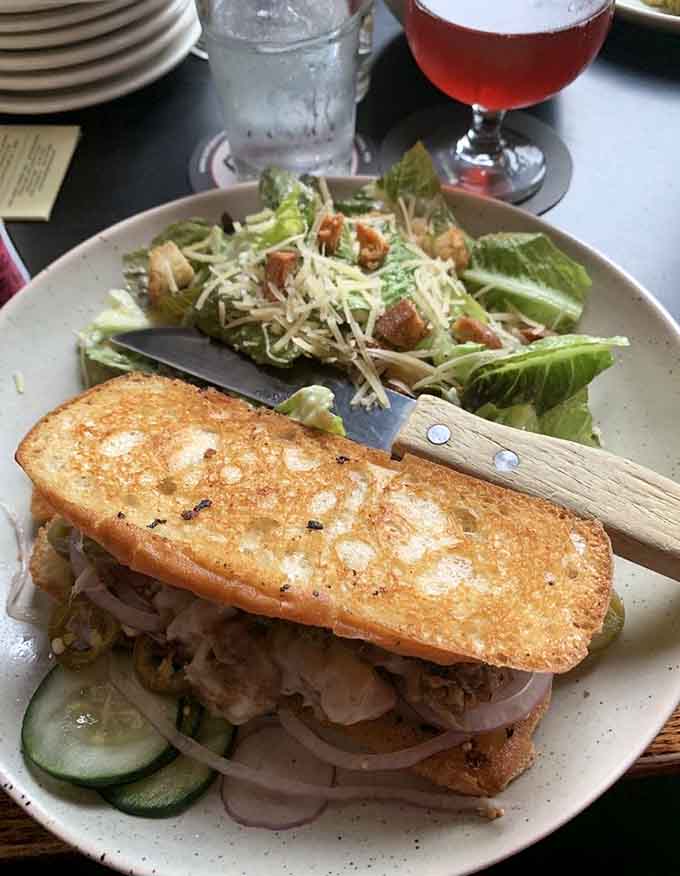 That Caesar salad isn't just playing second fiddle, it's bringing its own symphony of Parmesan and perfectly dressed romaine to the party.