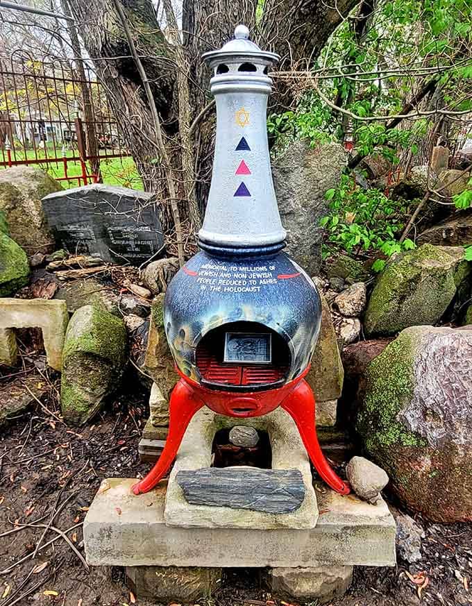 This colorful chimenea stands as a lighthouse of remembrance, its patriotic paint job belying the solemn memorial it represents for Holocaust victims.