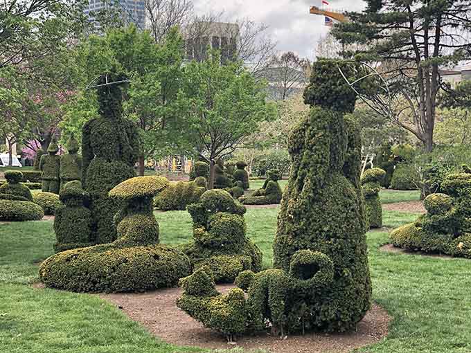 Walking among these sculptured figures feels like being inside a living painting where the subjects might start moving when you're not looking.