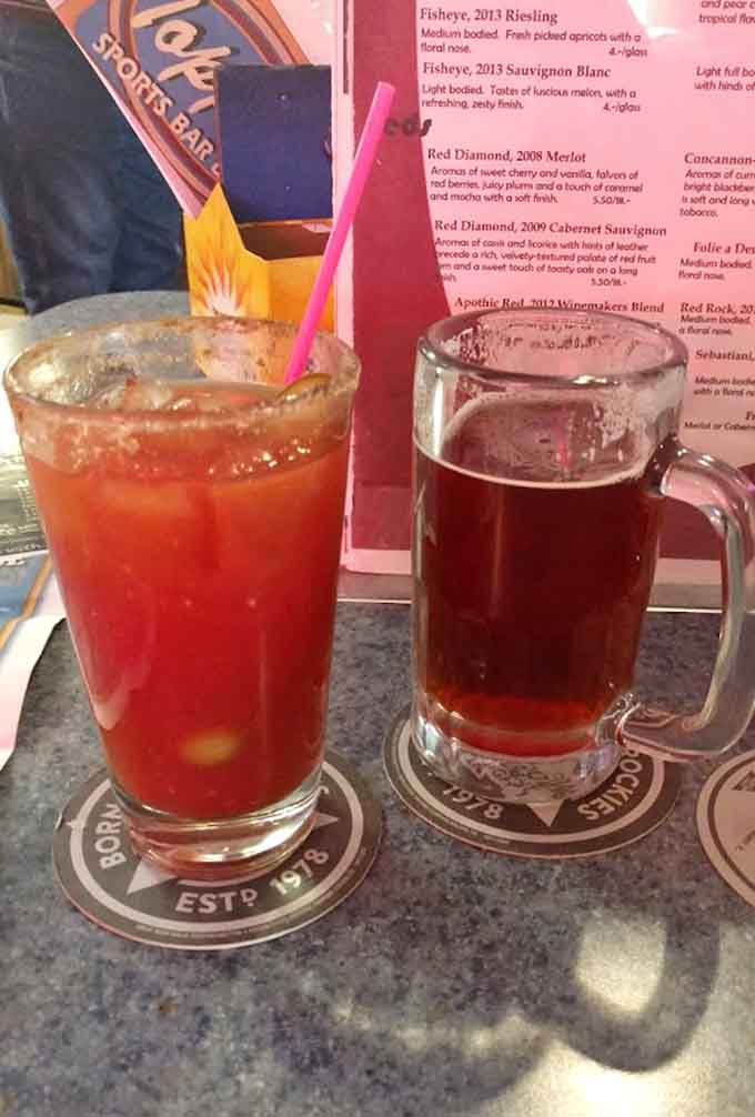 Colorful cocktails and cold beer provide the perfect liquid accompaniment to spicy wings and savory bar food.