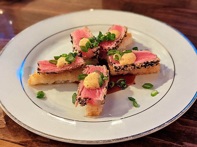 Sesame-crusted tuna tataki arranged like edible art &ndash; proof that beautiful food really does taste better.