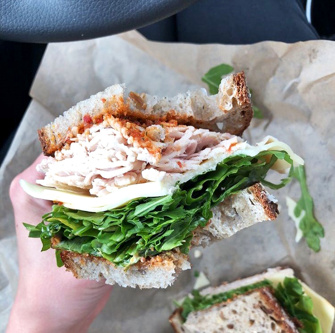This turkey sandwich isn't just lunch; it's edible architecture with layers of flavor that would make Frank Lloyd Wright jealous.