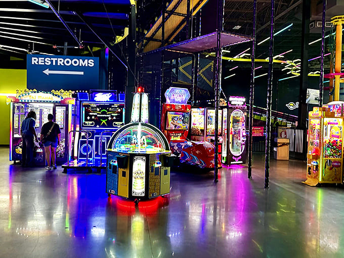 Flashing lights and electronic melodies create a sensory carnival in the arcade area, where tickets and bragging rights are the currency.
