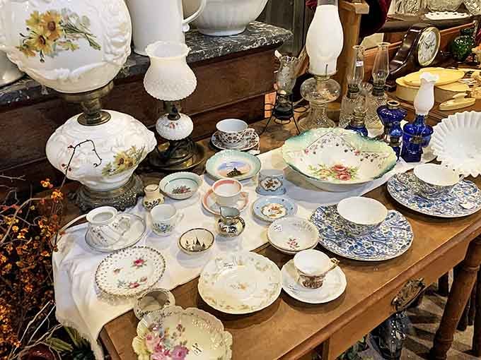 Delicate porcelain and oil lamps that once graced dining tables when electricity was still considered newfangled technology and suspiciously modern.