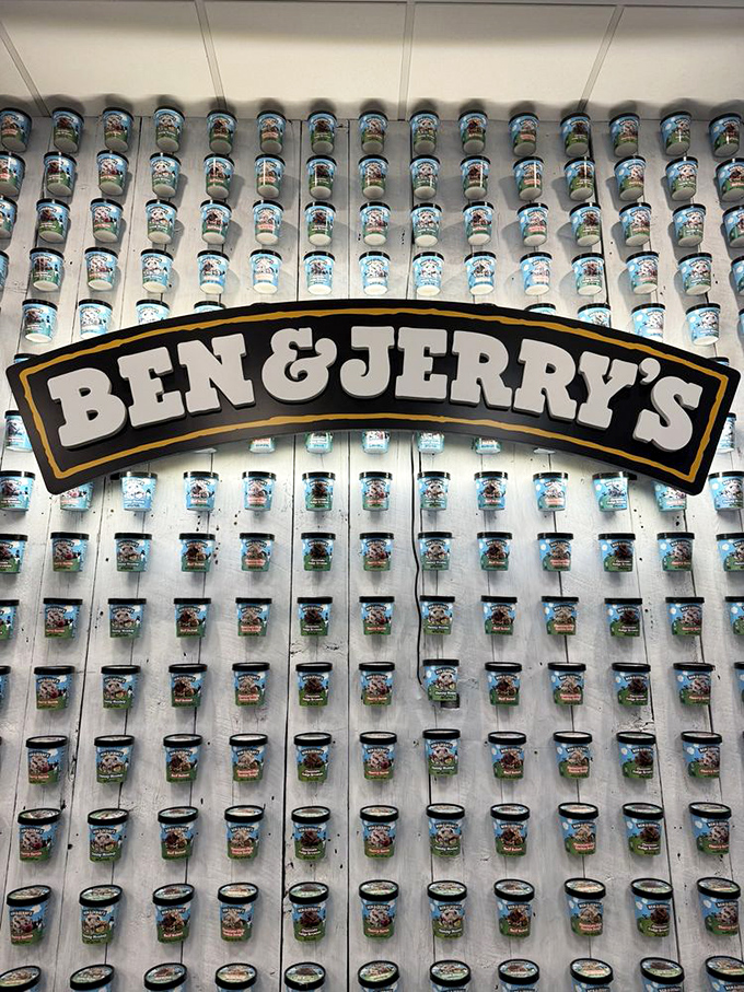 A wall of Ben & Jerry's history displayed through preserved pints. Like a dairy museum, it chronicles America's evolving ice cream tastes through the decades.