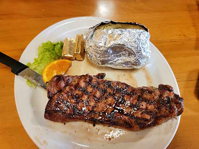 A properly grilled steak with a foil-wrapped potato proves that West Forty's dinner game is just as strong as its breakfast reputation.